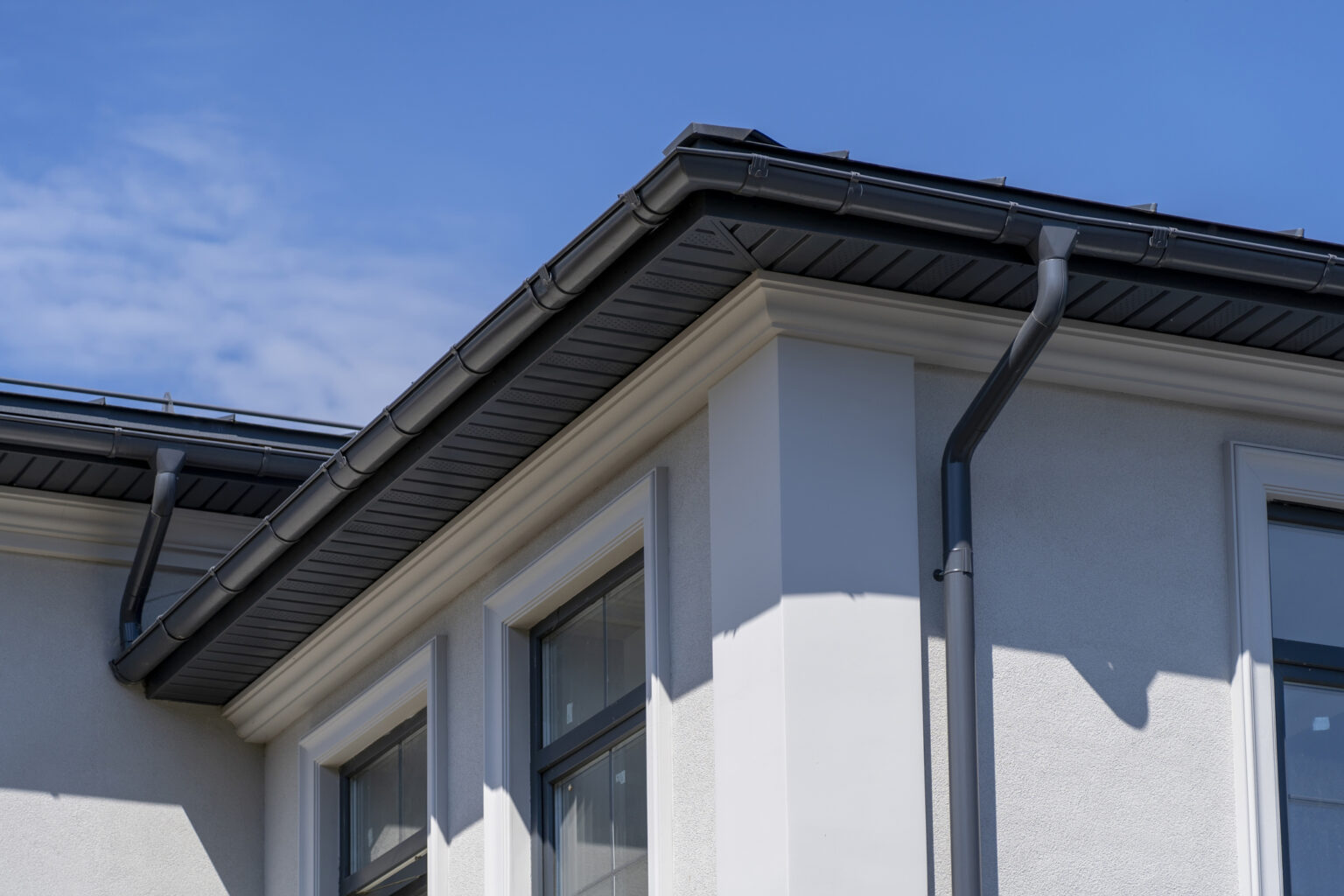 Why Invest in Roof Drainage Systems? - Piedmont Roofing